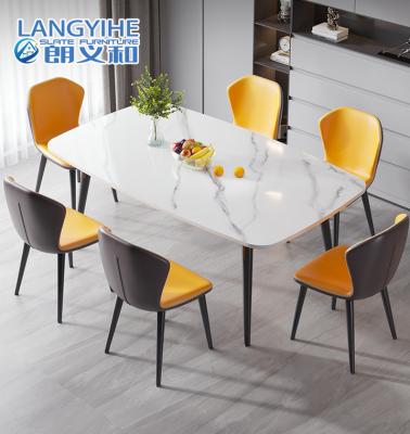 Cina Forma ovale di marmo minimalista di combinazione del tavolo da pranzo e della sedia del metallo in vendita