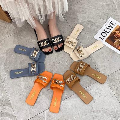 China New design summer flat bottom women cheap outdoor slippers fashion metal buckle retro non-slip sandals in stock for sale