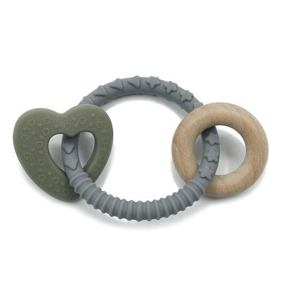 Cina Braccialetto sensoriale di legno di masticazione di Teether del silicone naturale infantile di Montessori in vendita