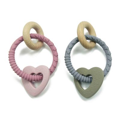Cina Braccialetto sensoriale di legno di masticazione di Teether del silicone naturale infantile di Montessori in vendita