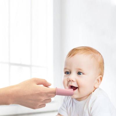 Cina Spazzolino da denti naturale del dito del bambino del silicone CPSIA per dentizione di formazione in vendita