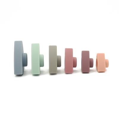 Cina L'impilamento del bambino del silicone del triangolo mettere i denti gioca il commestibile 100% in vendita