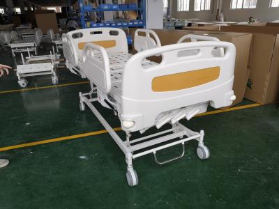China Three Crank Manual Patient ICU Care Bed PP Side Rails Pediatric Manual Hospital Bed for sale