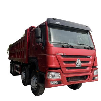 China Torque máximo 1500-2000Nm SINO TRUCK Usado HOWO 8*4 camião de descarga pesado à venda