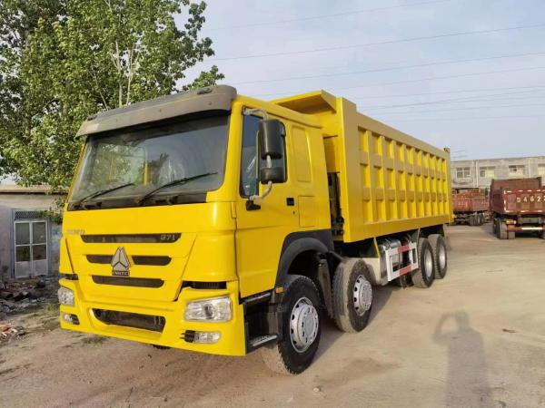 Quality RHD SINO HOWO 8X4 Heavy-duty Used Dump Tipper Truck G.V.W. 31T Gearbox for sale