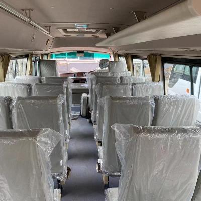 Cina Autobus Rhd Toyo ta Coaster con motore a turbocompressore e prestazioni in vendita