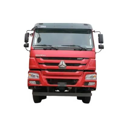 China Howo 8x4 12 wielen gebruikte tipper truck 40 ton 380 pk zware dump truck met links stuur Te koop