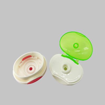 Cina Cappucci ovali del cappuccio di colore del doppio di forma di dimensione del collo della plastica pp 22mm per le bottiglie dello sciampo in vendita