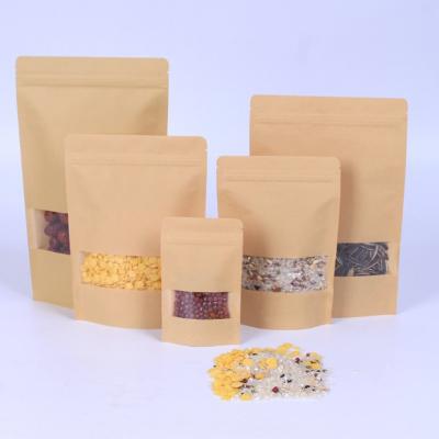 China Standing Up Food Grade Brown Kraft Paper Zipper Poly Bags with Clear Window for sale