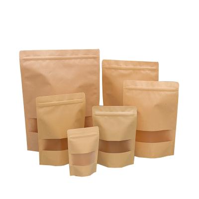 China Stand Up Pouch Kraft Paper Packaging Bag With Zipper and Window for sale
