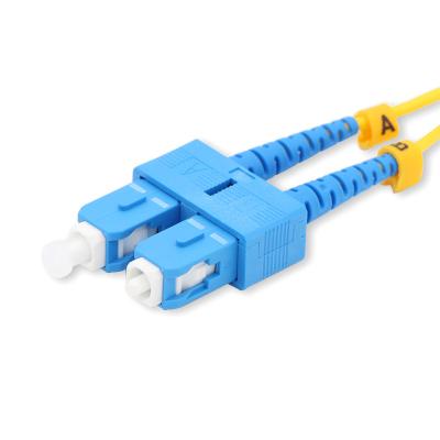 China Cordón a dos caras con varios modos de funcionamiento del cable del remiendo de la fibra óptica FTTH del Lc-Sc SM Os2 9/125um del descenso al aire libre interior del duplex en venta