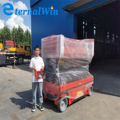 China 10m Lifting Height 350kg Red Electric Battery Scissor Lift Platform for sale
