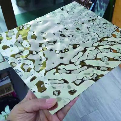 China Gepersonaliseerde breedte 301L Grade Water rippels Decoratieve roestvrij staal plaat Metalen wandpaneel voor architectonisch ontwerp Te koop