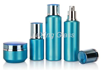 China Round Shape Blue Glass Cosmetic Jars With Lotion Pump Bottles 100ml factory