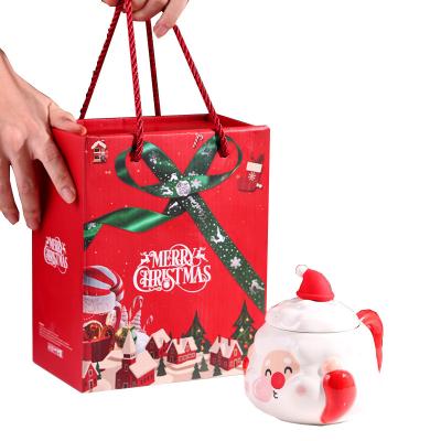 Cina American Style Natale Babbo Natale Uomo di Neve Tazza di caffè in ceramica con coperchio e cucchiaio Set regalo in vendita