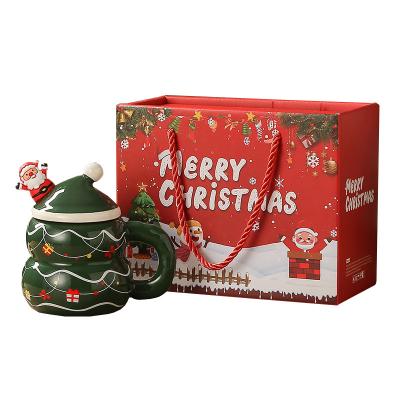 Cina 8.5x6.8cm ceramica natalizia design latte tazza di caffè tazza con scatola regalo uomo di neve Babbo Natale in vendita
