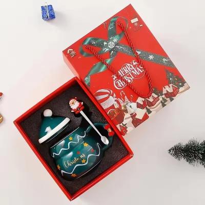 Cina Tazza ceramica da pupazzo di neve con coperchio e cucchiaio 16 oz tazza regalo di Natale per caffè tè e latte in vendita