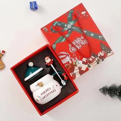 Cina Tazza ceramica da pupazzo di neve con coperchio e cucchiaio 16 oz tazza regalo di Natale per caffè tè e latte in vendita