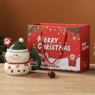 Cina 1 pezzo di garanzia Ceramica Santa Mug Coppa di Natale con disegno del logo personalizzato e cucchiaio in vendita