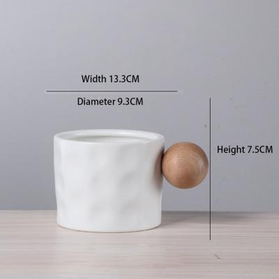 China Nordic Style Ceramic Coffee Mug with Wooden Ball Handle 330ML Porcelain Reusable Cups for sale