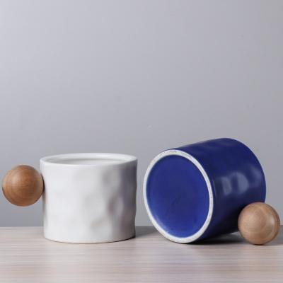 China Nordic Style Ceramic Coffee Mug with Wooden Ball Handle 330ML Porcelain Reusable Cups for sale