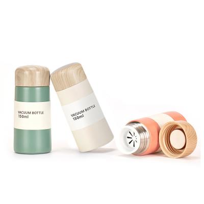 China 304 Stainless Steel Tumbler Vacuum Flask Mini Water Bottle Cup with Customized Color Wood Grain Lid for sale