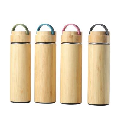 China Metalen type roestvrij staal op maat gemaakt bamboe houten thermosfles met houten deksel Te koop