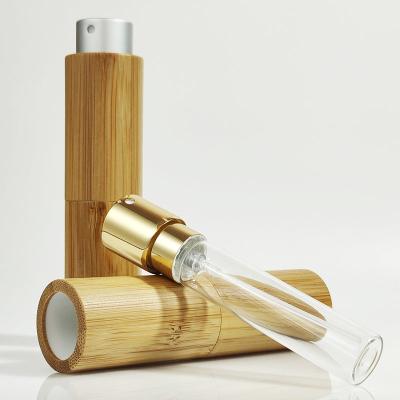 China Empty 10ml 20ml 8ml Refillable Portable Liquid Container Bamboo Plastic Perfume Atomizer Spray Bottle for sale