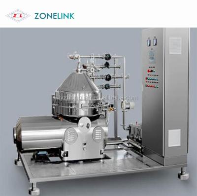 Cina separatore crema della centrifuga del disco del succo della polpa della frutta del lievito del latte automatico dell'ugello per la centrifuga della pila di disco del latte dell'olio in vendita