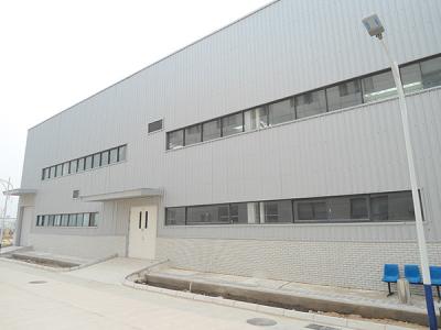 China Welded H Section Prefab Steel Warehouse Buildings High Strength Eco Steel Buildings for sale