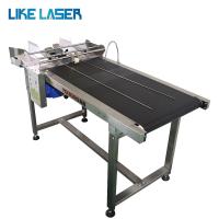 China CO2 Fly Laser Marking Machine for PET Bottle Plastic Bottle Online Coding 30W for sale