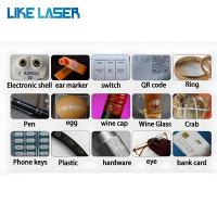 China CO2 Flying Laser Marking Machine 30W for Online Production Date Coding on Plastic Labels for sale
