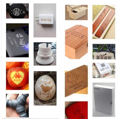 中国 オートフォーカスガルボ CO2マークマシン シナードレーザーソース60Wと20mmフィールドレンズ 販売のため