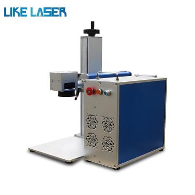 Cina Negozi di abbigliamento Macchine di marcatura laser a tornio mini metallo con velocità di marcatura 0-7000mm/S in vendita