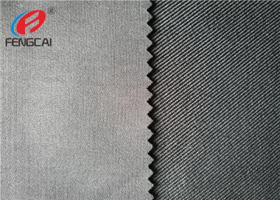 China Waterproof Black Soild Color Twill Fabric 90 Polyester 10 Spandex For Garment for sale