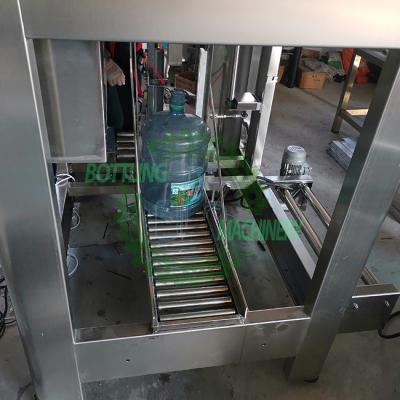 中国 5ガロン水びん詰めにする機械の自動プラスチック フィルムのBaggingの包装業者 販売のため