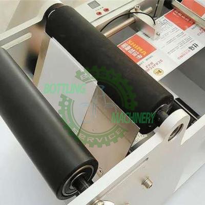 Cina Semi-automatico con la codifica del giro autoadesivo può stonare per imbottigliare l'etichettatrice in vendita