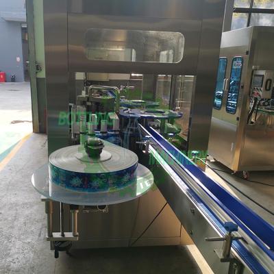 Cina 12000BPH con l'etichettatrice della colata del tamburo OPP di vuoto della bottiglia calda della colla in vendita