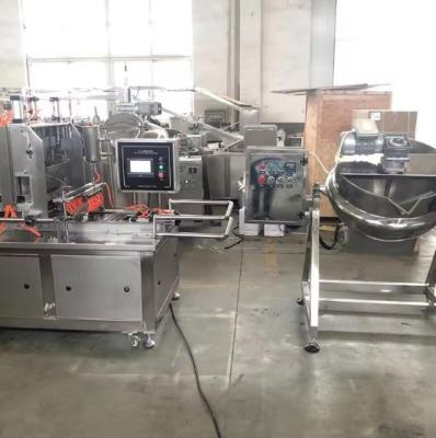 China Industrie Halbautomatische Mehrtypen-Süßigkeitenformende Süßigkeiten-Gießmaschine für Lebensmittel 40-50 kg/h zu verkaufen