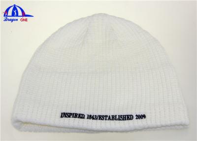 China 100% Acrylic Knit Beanie With Check Jacquard Dot Pattern With Emb On Front for sale