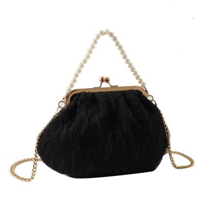 China 2024 NEW RETRO FAIRY SOLID COLOR SMALL BAG WHITE HAND PEARL BAG WOMEN'S NET YARN INS SIMPLE CROSSBODY BAG for sale