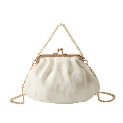 China 2024 NEW RETRO FAIRY SOLID COLOR SMALL BAG WHITE HAND PEARL BAG WOMEN'S NET YARN INS SIMPLE CROSSBODY BAG for sale