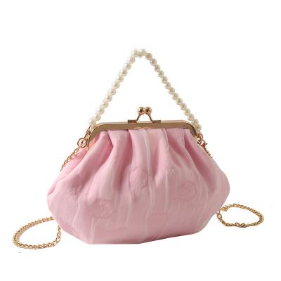 China 2024 NEW RETRO FAIRY SOLID COLOR SMALL BAG WHITE HAND PEARL BAG WOMEN'S NET YARN INS SIMPLE CROSSBODY BAG for sale