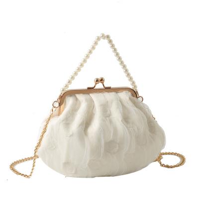 China 2024 NEW RETRO FAIRY SOLID COLOR SMALL BAG WHITE HAND PEARL BAG WOMEN'S NET YARN INS SIMPLE CROSSBODY BAG for sale