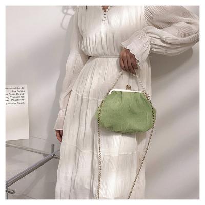 China 2024 NEW RETRO FAIRY SOLID COLOR SMALL BAG WHITE HAND PEARL BAG WOMEN'S NET YARN INS SIMPLE CROSSBODY BAG for sale