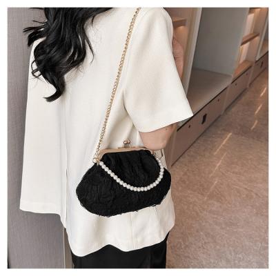China 2024 NEW RETRO FAIRY SOLID COLOR SMALL BAG WHITE HAND PEARL BAG WOMEN'S NET YARN INS SIMPLE CROSSBODY BAG for sale