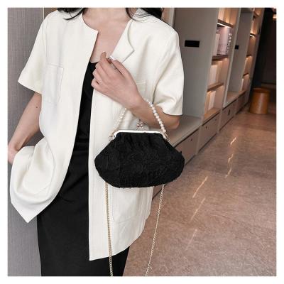 China 2024 NEW RETRO FAIRY SOLID COLOR SMALL BAG WHITE HAND PEARL BAG WOMEN'S NET YARN INS SIMPLE CROSSBODY BAG for sale