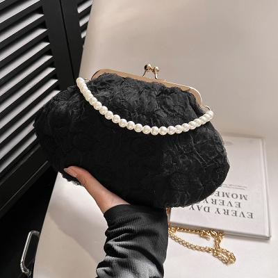 China 2024 NEW RETRO FAIRY SOLID COLOR SMALL BAG WHITE HAND PEARL BAG WOMEN'S NET YARN INS SIMPLE CROSSBODY BAG for sale