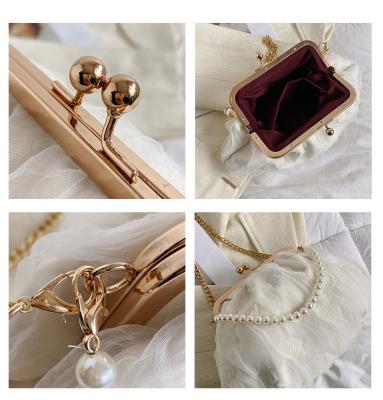 China 2024 NEW RETRO FAIRY SOLID COLOR SMALL BAG WHITE HAND PEARL BAG WOMEN'S NET YARN INS SIMPLE CROSSBODY BAG for sale