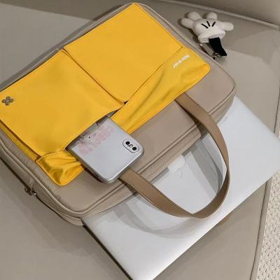 China TREND UNIVERSAL MEN'S AND WOMEN'S SENSHI SMALL FRESH LAPTOP BAG LIGHT, STYLISH AND WATERPROOF for sale